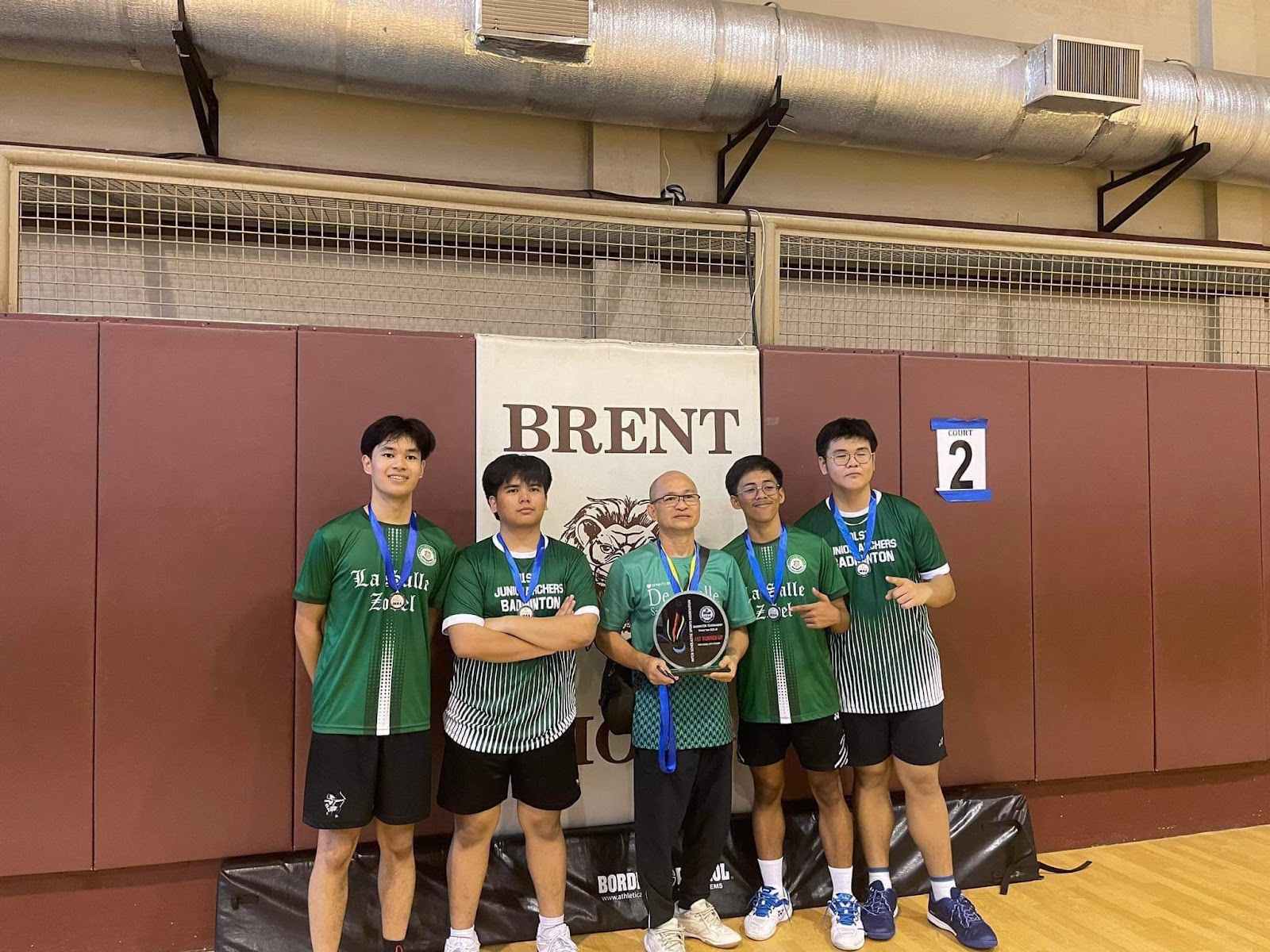 DLSZ Badminton Varsity Team smashes for Gold! - De La Salle Santiago Zobel